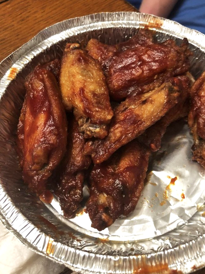 Wings so saucy they should come with their own napkin dispenser. That glistening coating promises the perfect balance of heat and sweet.