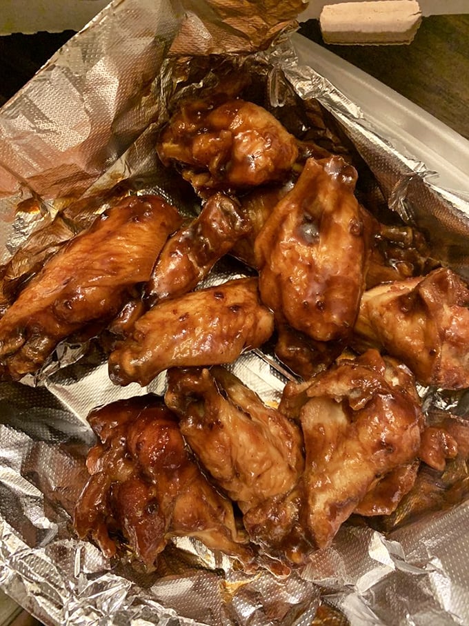 These wings aren't just coated in sauce &ndash; they're baptized in it. The kind of sticky-fingered experience worth every napkin.