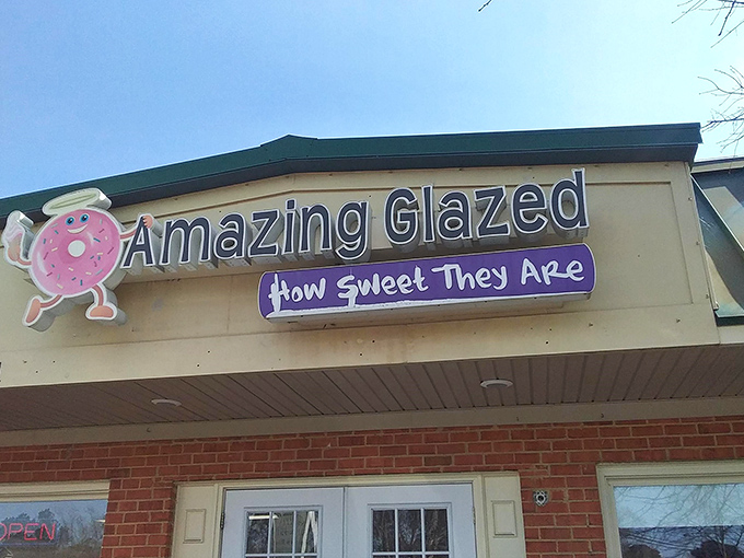 Amazing Glazed's sign tells no lies – those cartoon donuts are practically winking at you, promising sweet satisfaction inside.