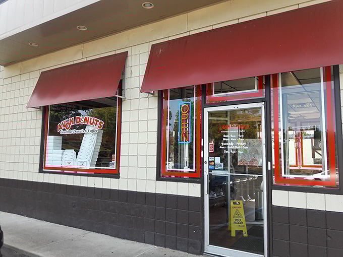 Avon Donuts' clean white exterior with red accents is like the business suit of donut shops &ndash; professional on the outside, party on the inside.