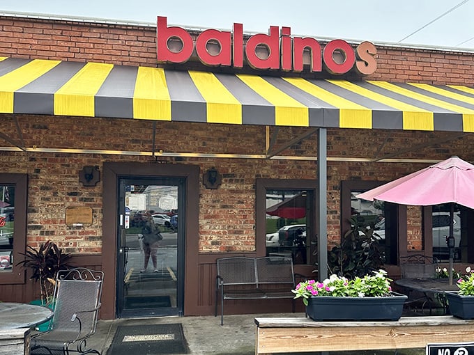 That yellow and black striped awning isn't just eye-catching &ndash; it's nature's way of saying "serious sandwiches inside!" 