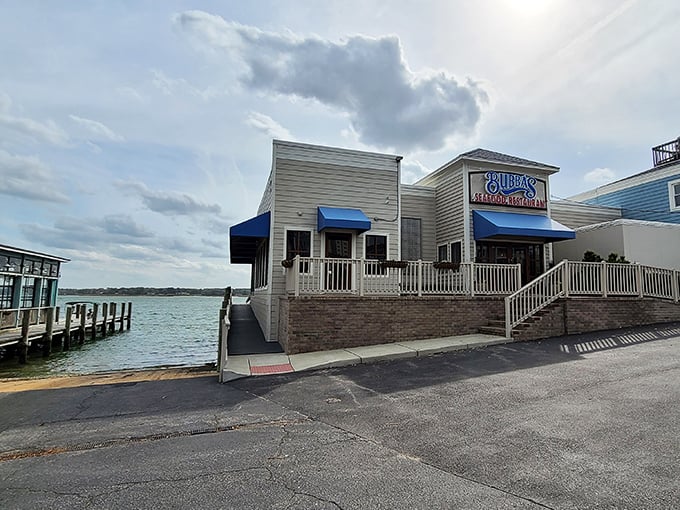 Bubba's sits perfectly positioned for waterfront dining magic. Those white railings frame seafood memories waiting to happen.