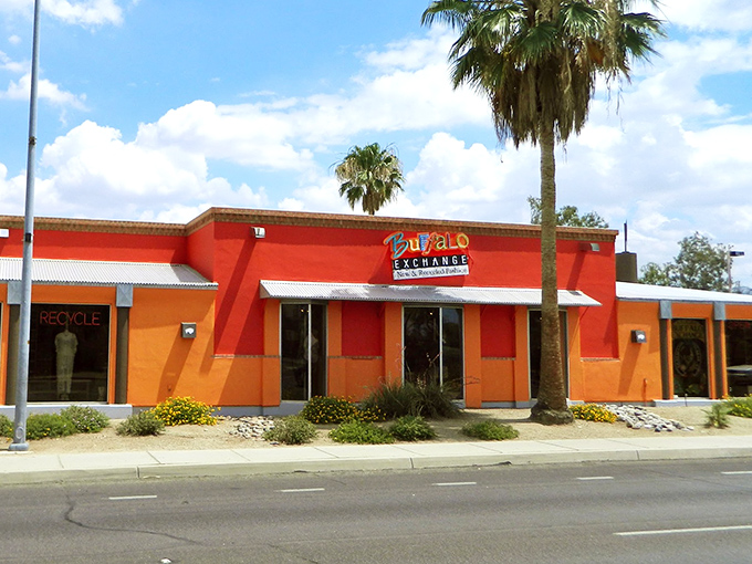 Buffalo Exchange's sunset-colored building stands out like a fashionable rebel among the palm trees and desert landscape.