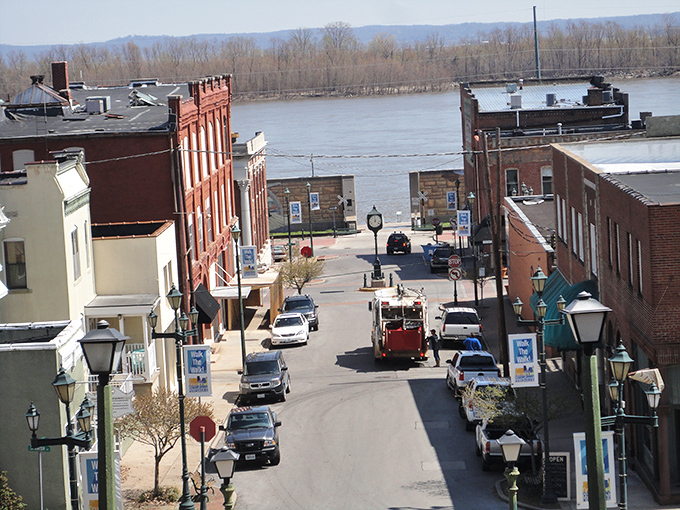 River town charm flows downhill toward the mighty Mississippi like liquid history.