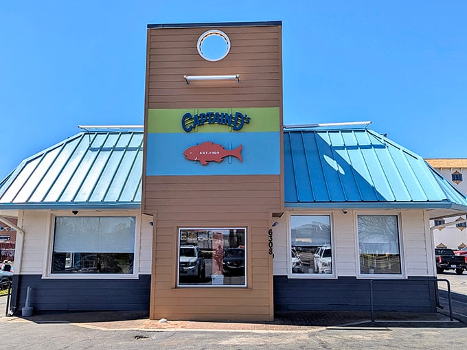 The classic Captain D's sign stands like a lighthouse for hungry travelers. Some traditions are worth keeping!