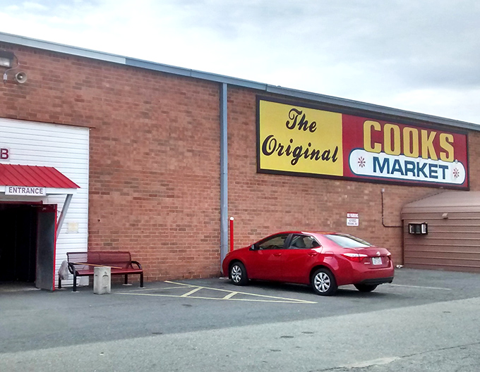 The Original Cook's Market announces itself with vintage signage that's stood the test of time, just like its loyal shoppers.