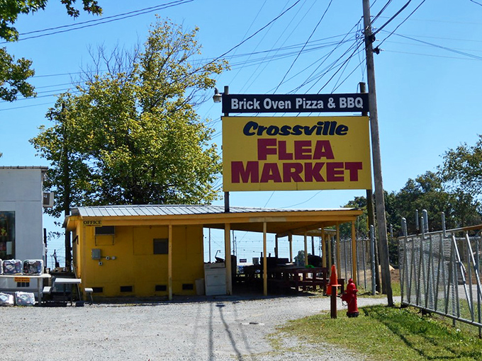 Crossville Flea Market's humble yellow entrance - don't judge this treasure trove by its cover, the real magic happens inside.