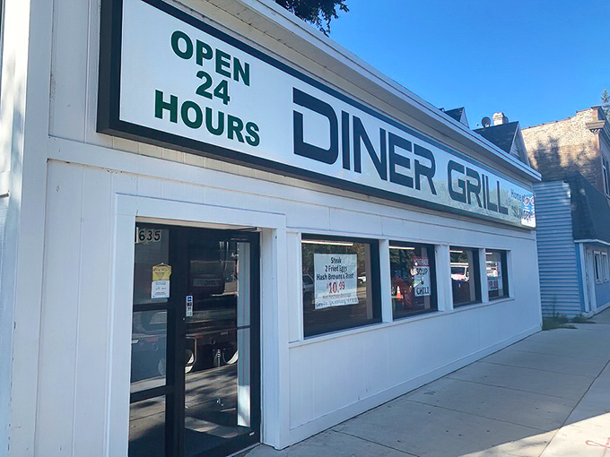Diner Grill's "OPEN 24 HOURS" sign &ndash; three beautiful words for night owls and early birds alike.