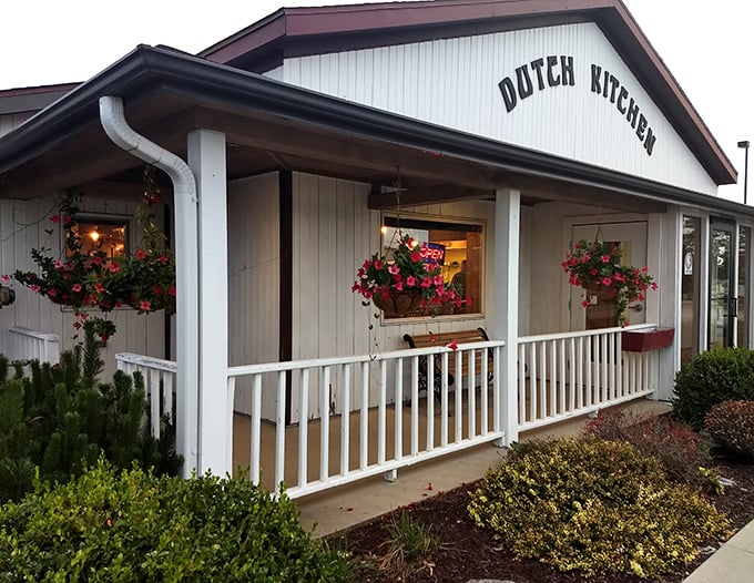 Dutch Kitchen Restaurant: Hanging flower baskets and a white porch welcome you to carb heaven. Your diet plan just called – it's taking the day off.