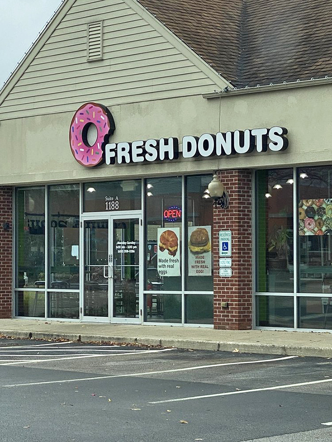 Fresh Donuts' pink sign brightens even the cloudiest Illinois day. That simple storefront hides a world of hand-crafted morning magic!