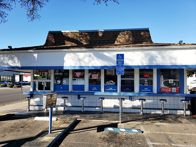 H&W Drive-In's blue and white exterior is a portal to simpler times, when burgers were thin and milkshakes were thick.