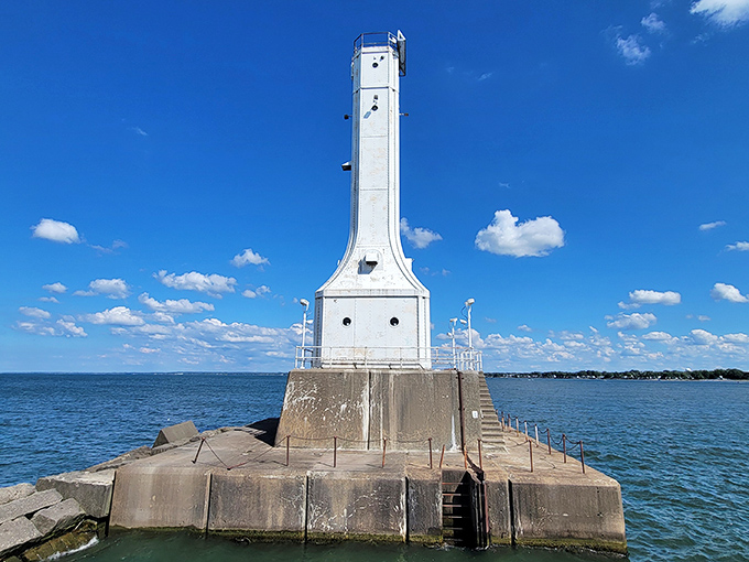 Huron's sleek white sentinel stands at attention where river meets lake. Modern design meets timeless purpose.