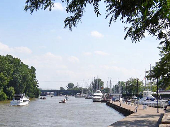 Huron's river meets Lake Erie in a gentle embrace, creating a boater's highway to adventure.