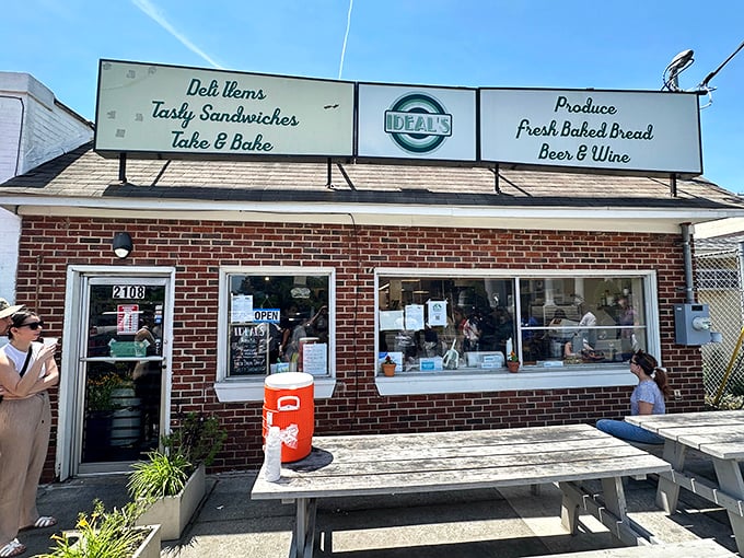 Ideal's storefront proudly announces its dual identity—part grocery, part sandwich heaven, all delicious.