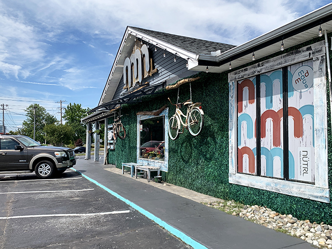 MadMacs' quirky exterior with its artificial turf wall and bicycle decor hints at the creative burgers waiting inside.