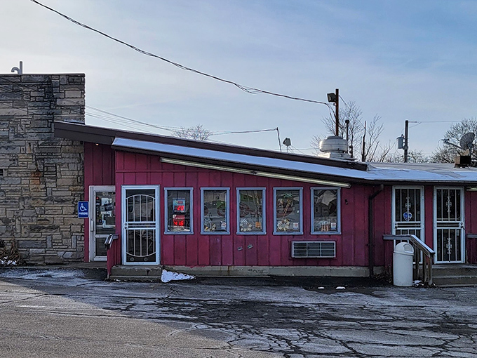 Porky's stone wall and pink siding combo is like the mullet of architecture&mdash;business in front, party in the kitchen.