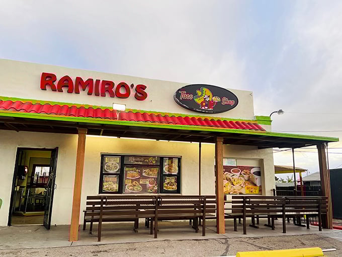 Ramiro's cheerful red sign promises taco shop treasures. The simple benches outside are perfect for savoring that first glorious bite!