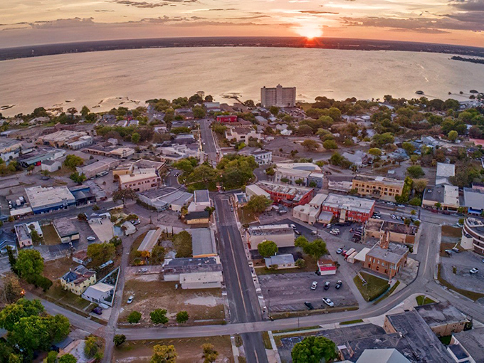 Sebring's downtown in aerial view has that "Mayberry meets Florida" feel – where your retirement dollars stretch like saltwater taffy on a summer day.