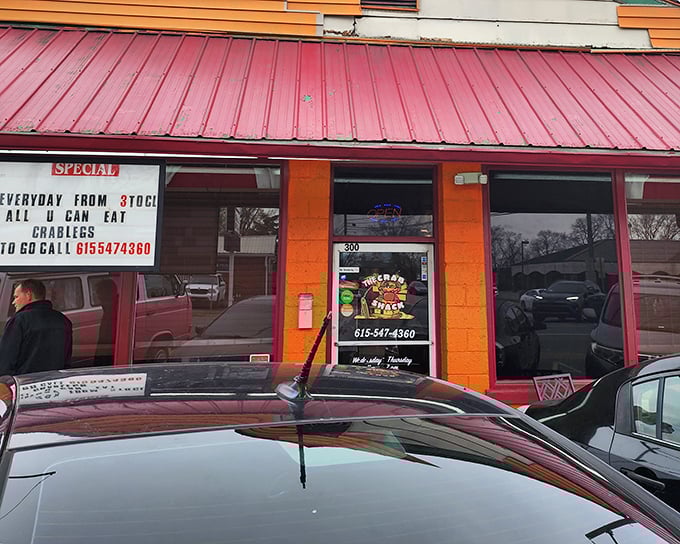 The Crab Shack's vibrant orange building isn't subtle, but neither is the joy of all-you-can-eat crab legs advertised in their window!