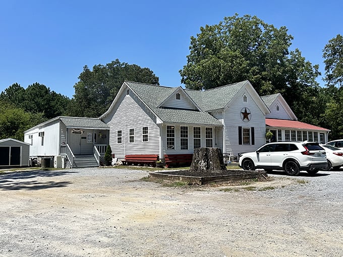 The Steak House's white farmhouse exterior promises the comfort food equivalent of a warm Georgia hug.