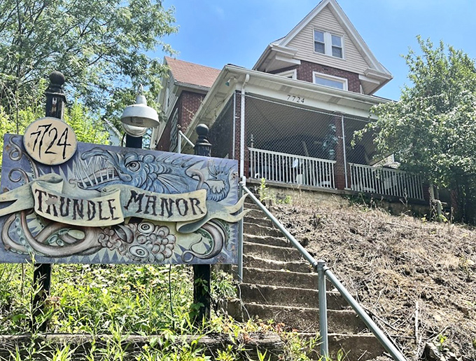 Trundle Manor's quirky sign hints at the wonderfully weird world waiting inside. Curiouser and curiouser, as Alice would say!