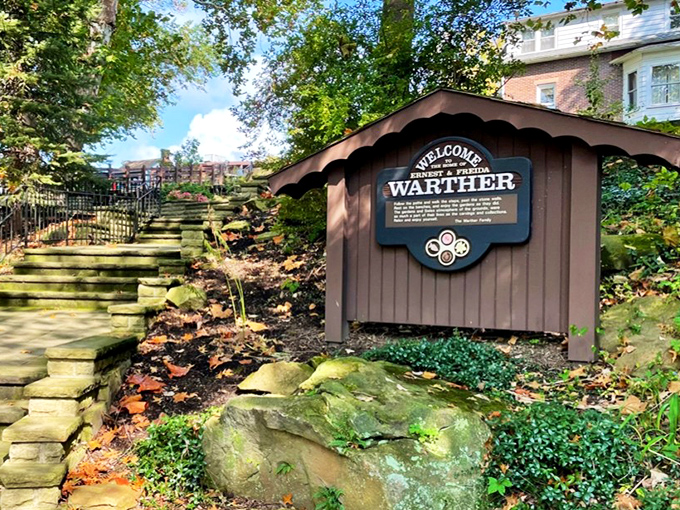 Stone steps lead to the Warther Museum, where wooden wonders await. Craftsmanship that makes your IKEA furniture weep!