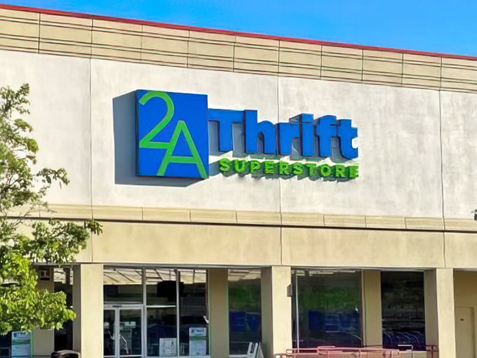 The bold blue and green logo pops against the neutral building like a superhero emblem for thrift shoppers. This "superstore" lives up to its grand title!