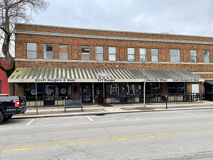 Historic brick and a welcoming awning – 317 Burger blends Indy's past with present-day burger perfection.