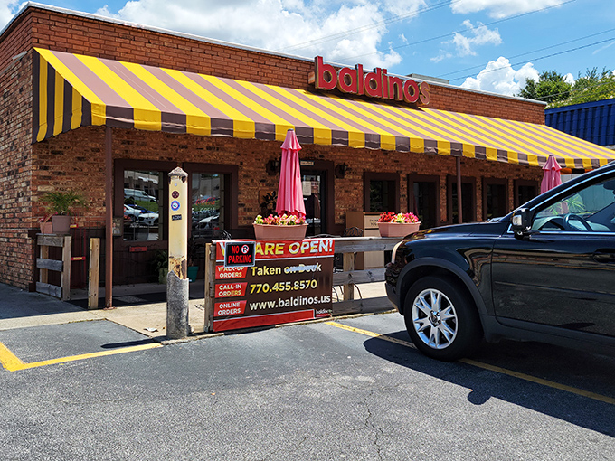 Baldinos' brick exterior and cheerful awning create the perfect setting for Jersey-style sub perfection. 