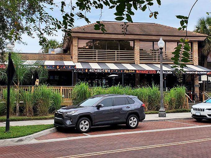 The wooden deck and breezy setting at Big John's proves barbecue doesn't need to be eaten in a shack to be authentic.