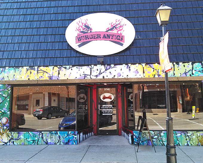 The colorful exterior hints at the flavor fireworks happening inside. Prepare for burger joy that defies convention.