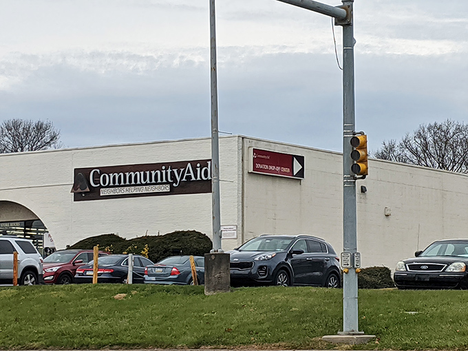 CommunityAid stands ready for another day of treasure-hunting. The unassuming building houses floor-to-ceiling bargains waiting to be discovered.