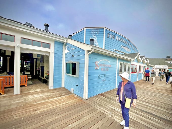 Blue buildings and wooden decks create the perfect seafood setting. Fog Harbor proves that even popular tourist spots can hide authentic seafood treasures.