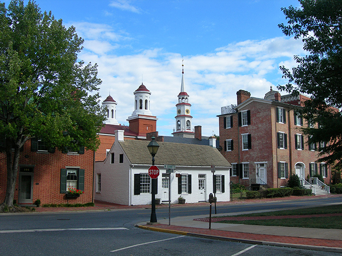 Historic brick storefronts stand at attention, ready to welcome visitors who appreciate craftsmanship from a more patient era.