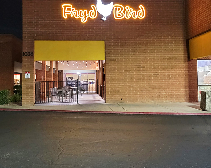 That glowing sign beckons like a lighthouse for anyone seeking crispy chicken salvation after dark. 