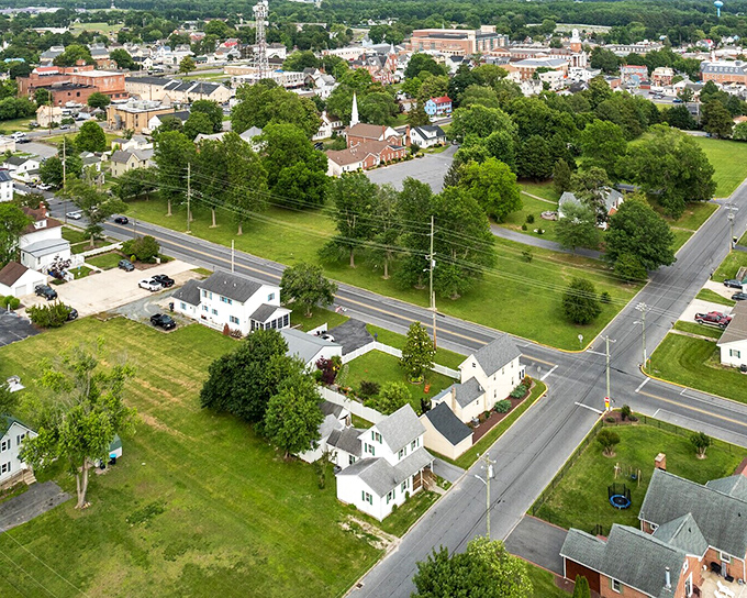The heart of Sussex County beats in Georgetown's town center, where roads converge like spokes on a historical wheel.