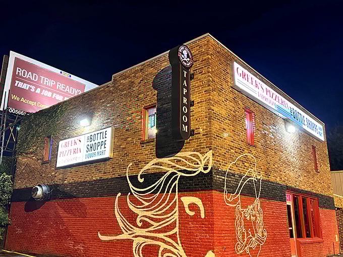 By night, Greek's Pizzeria glows like a beacon for hungry Hoosiers seeking that perfect cheese pull.