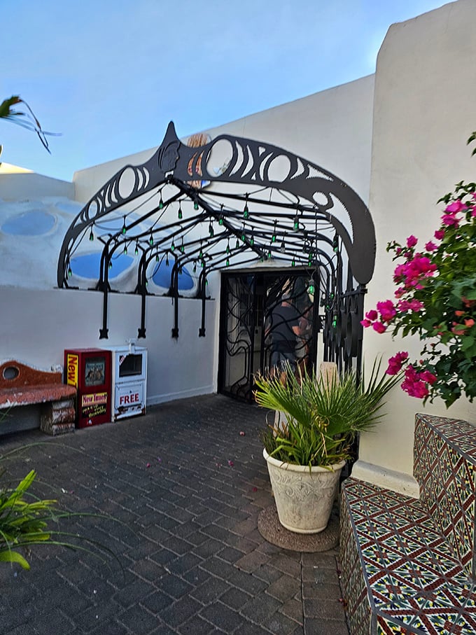 An elegant wrought-iron entrance beckons you into Los Olivos. Like the gateway to a Mexican food paradise!