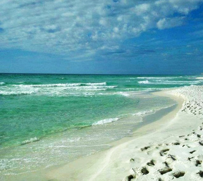 The meeting of sky and water at Navarre Beach creates a horizon line that seems to stretch into next Tuesday.