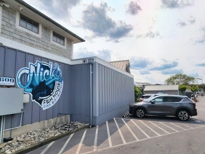 Nick's Fish House: With its prominent blue and white circular logo, promises a seafood haven, beckoning you to step inside and discover its culinary delights.