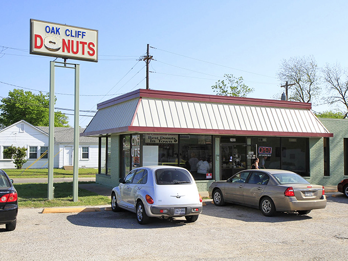 No-nonsense donut perfection in its natural habitat. The parking lot's full for a reason, folks.