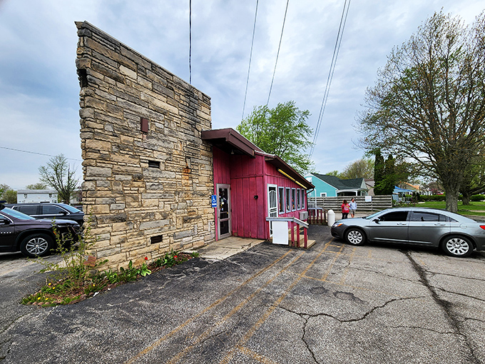 That stone facade at Porky's has witnessed generations of first dates, family dinners, and "just one more bite" moments.