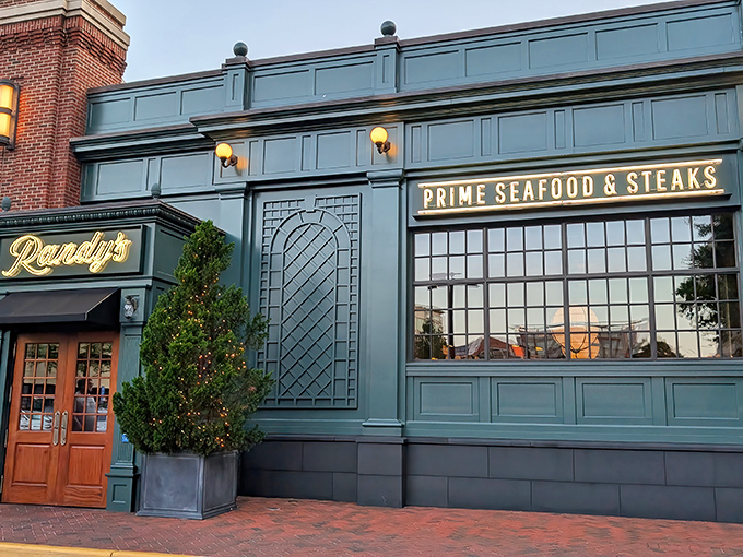 Evening light makes Randy's emerald facade glow with possibility. That doorway leads to a world where seafood and steaks live in perfect harmony.
