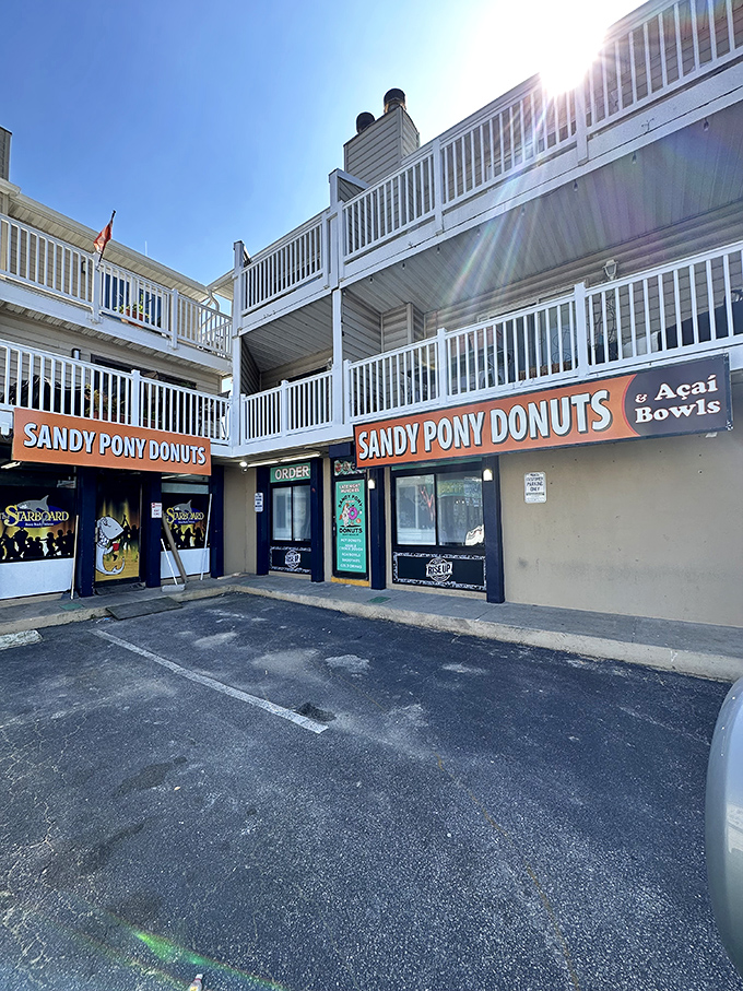 Vacation rentals above, donut heaven below. Sandy Pony's beachside location makes sweet memories by the shore.