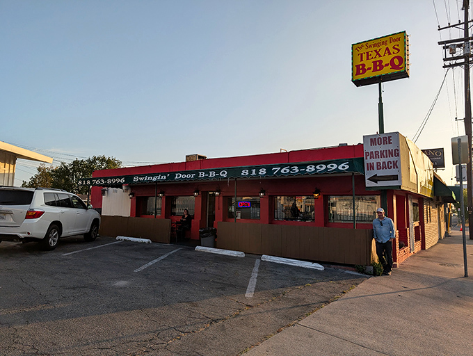 Texas pride flies high above this humble BBQ joint where the parking lot fills with the perfume of properly smoked meat.
