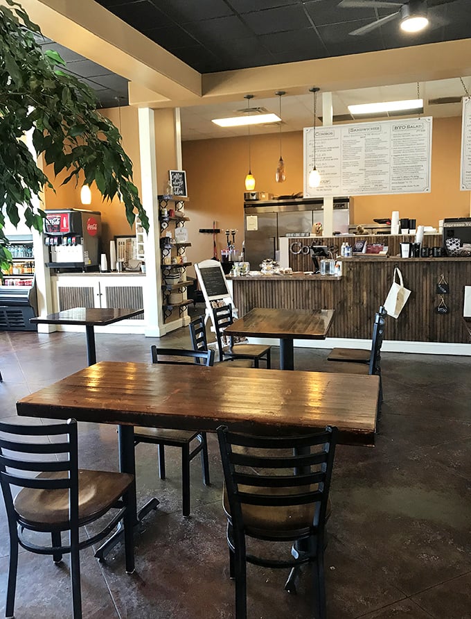 Warm wood tones and rustic touches create the perfect backdrop for morning conversations that flow as smoothly as their locally-roasted coffee.