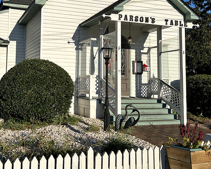 That white picket fence and mint green trim hint at the Southern charm inside. Stained glass and steaks make a heavenly combination.