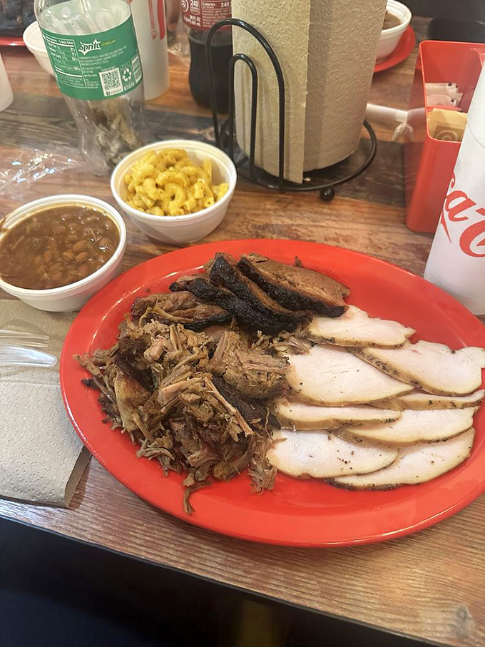 The three meat combo&mdash;because choosing just one would be like picking a favorite child. Smoky diplomacy at its finest.