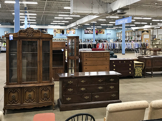 Furniture that outlasted the trends that inspired it. That china cabinet has witnessed more family dinners than a Thanksgiving turkey.