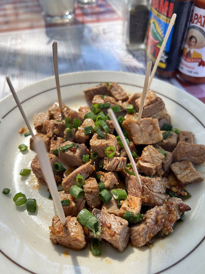 These spicy steak bites with green onions are like flavor grenades&mdash;small but mighty, and guaranteed to make your taste buds stand at attention.